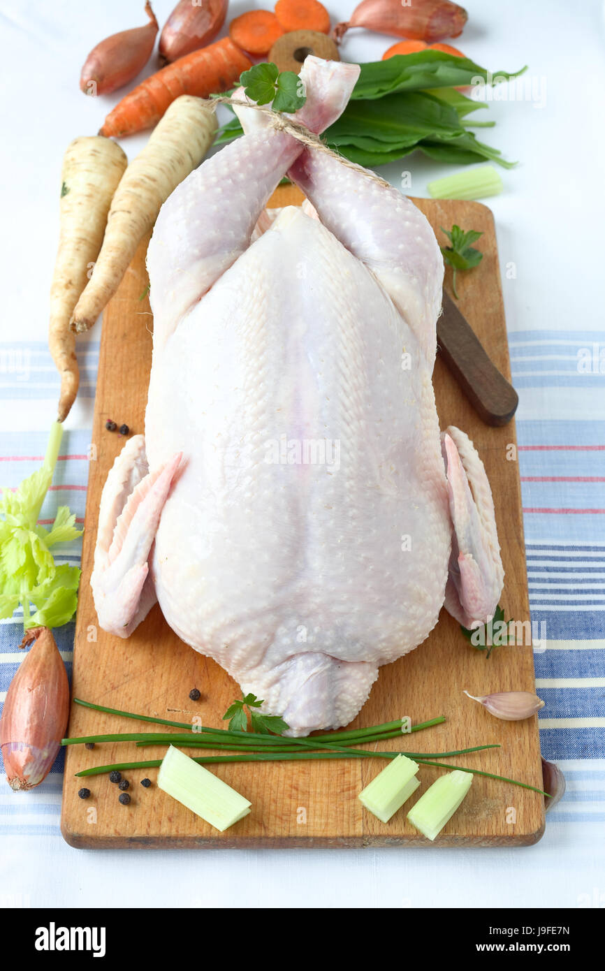 Whole raw chicken Stock Photo - Alamy