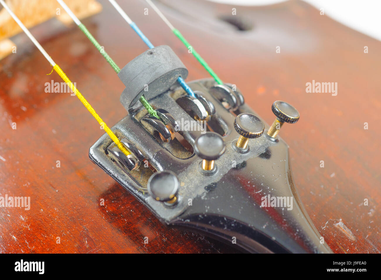 one violin image .old brown stringed wooden instrument close up view ...