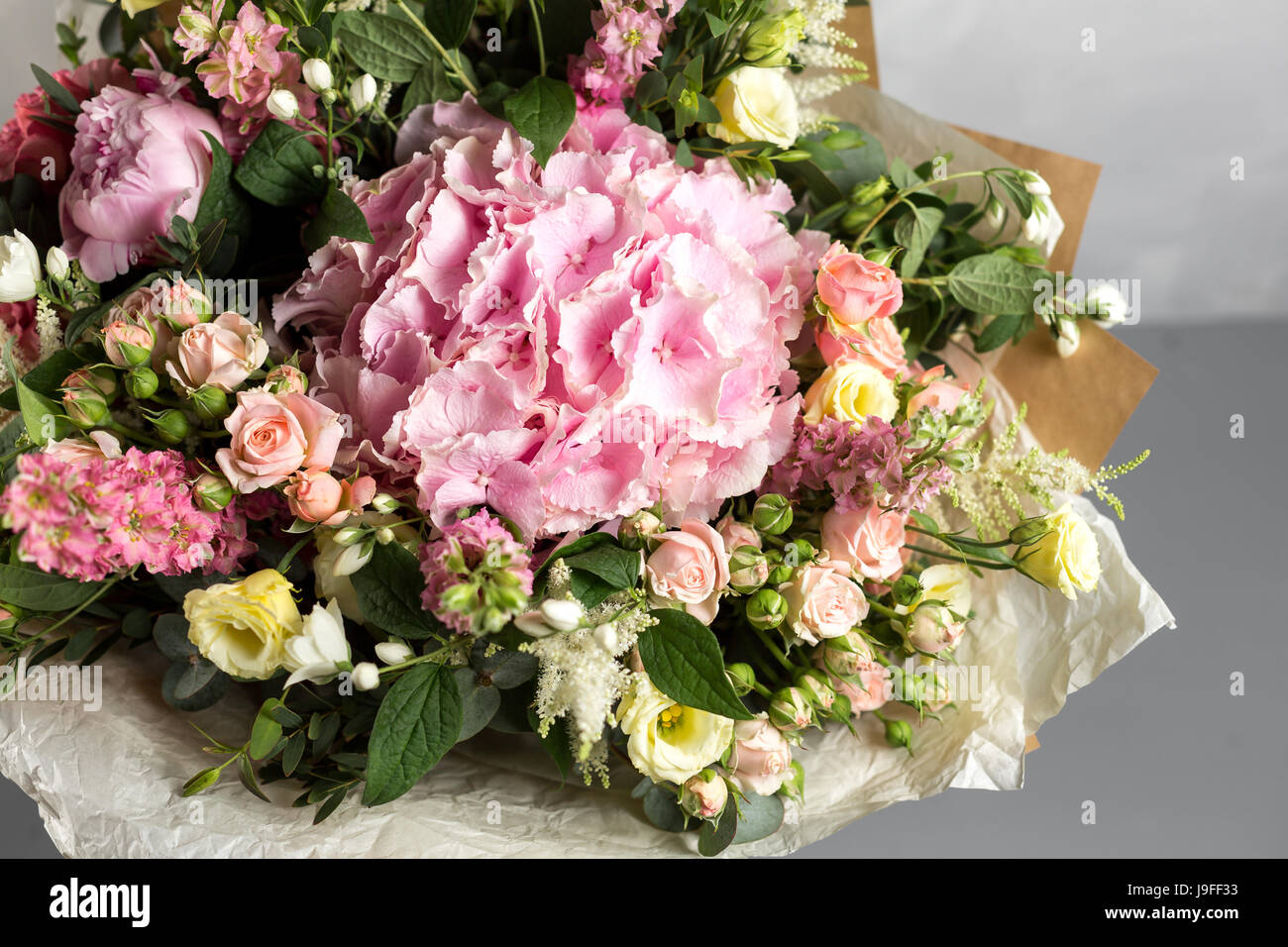 Still life with a bouquet of flowers. the florist put together a ...