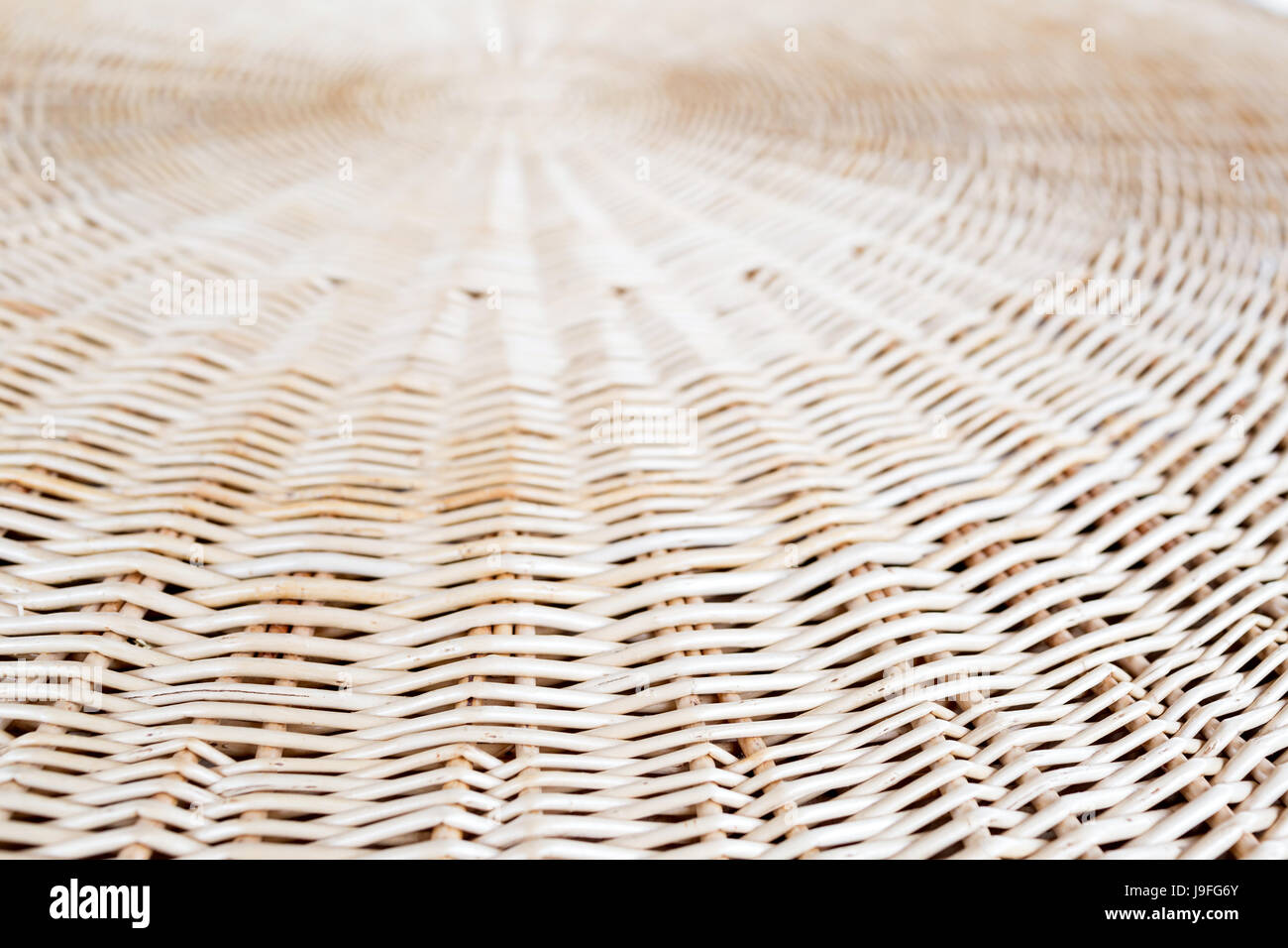 Cane or wickerwork background- showing the details of interlaced weave ...