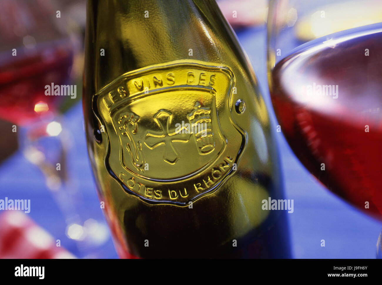 COTES DU RHONE Bottle with relief embossed label of Côtes du Rhône red ...