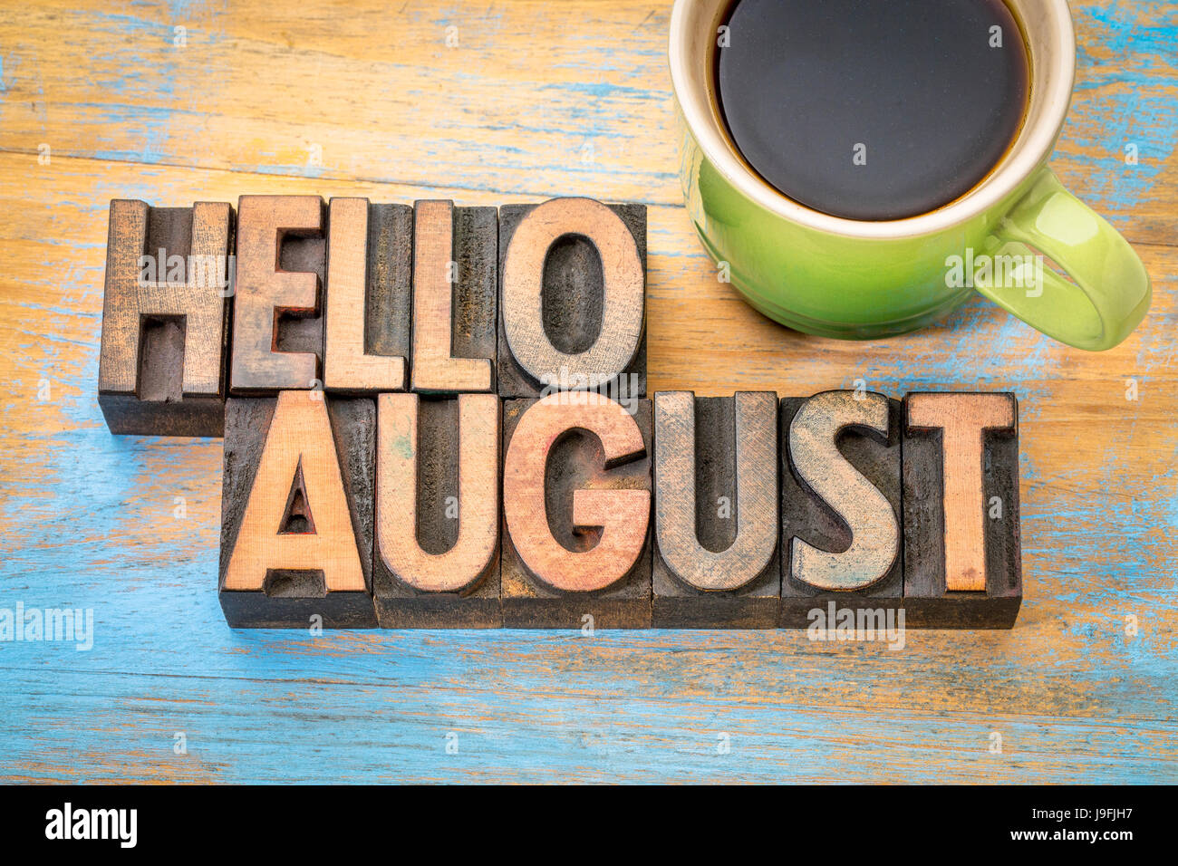 Hello August- word abstract in vintage letterpress wood type blocks ...