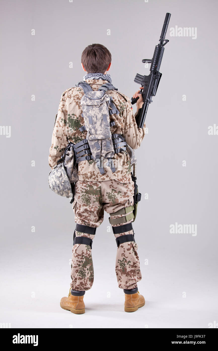 Army soldier military standing helmet hi-res stock photography and ...