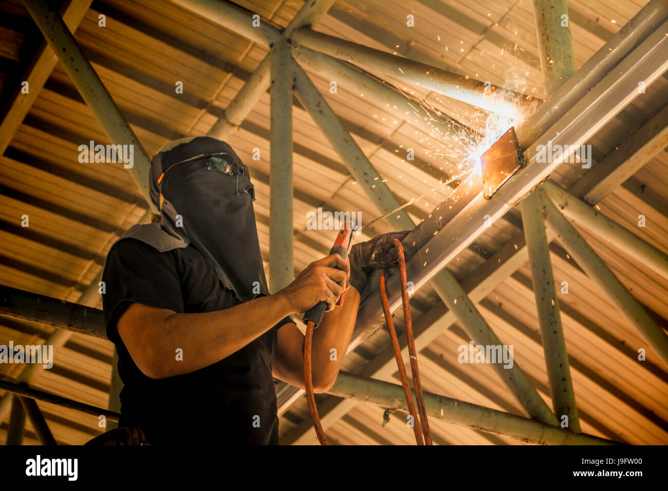 Man Welding Roof High Resolution Stock Photography and Images - Alamy