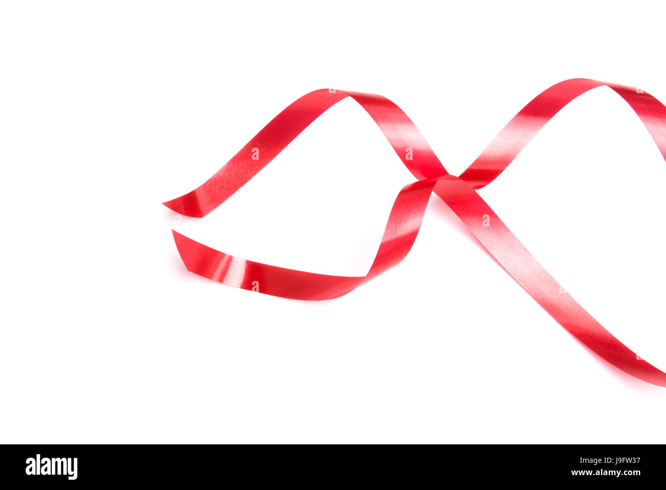 the spiral red ribbon isolated on white background Stock Photo - Alamy