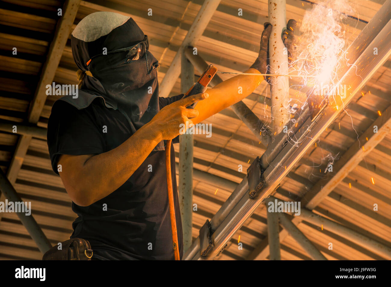 Man Welding Roof High Resolution Stock Photography and Images - Alamy