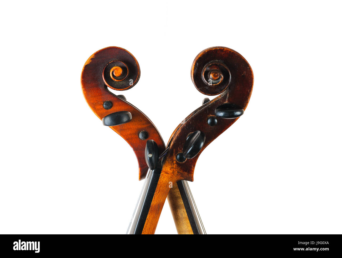 two violin image .old brown stringed wooden instrument isolated on the ...