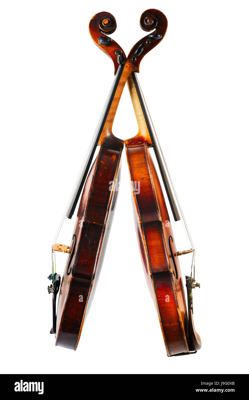 two violin image .old brown stringed wooden instrument isolated on the ...
