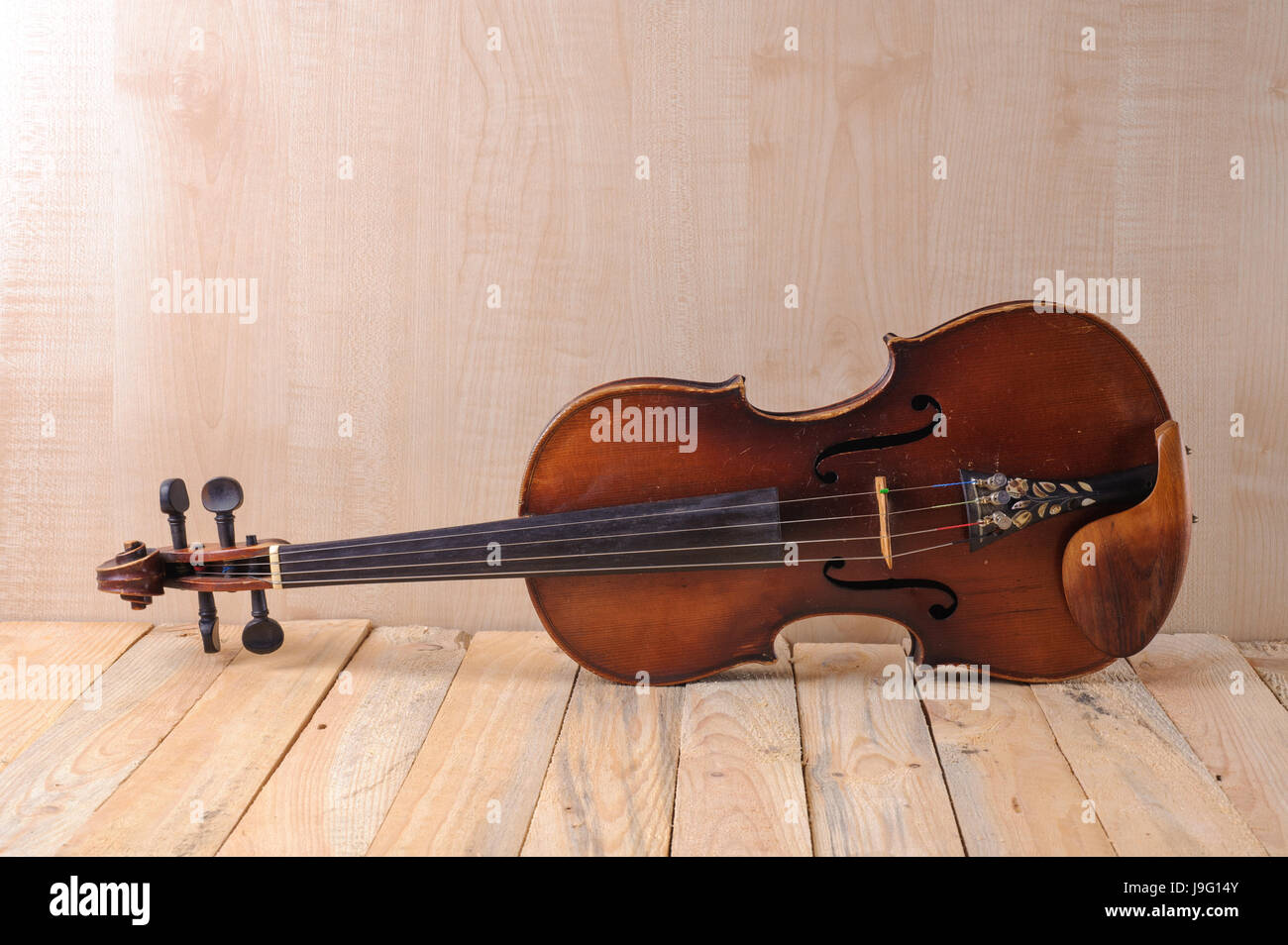 one violin image .old brown stringed wooden instrument isolated on the ...