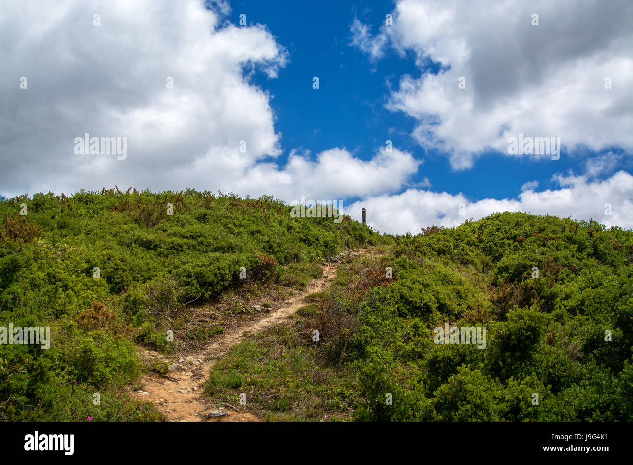 gravel path into the sky. path in a hill toward the sky Stock Photo - Alamy