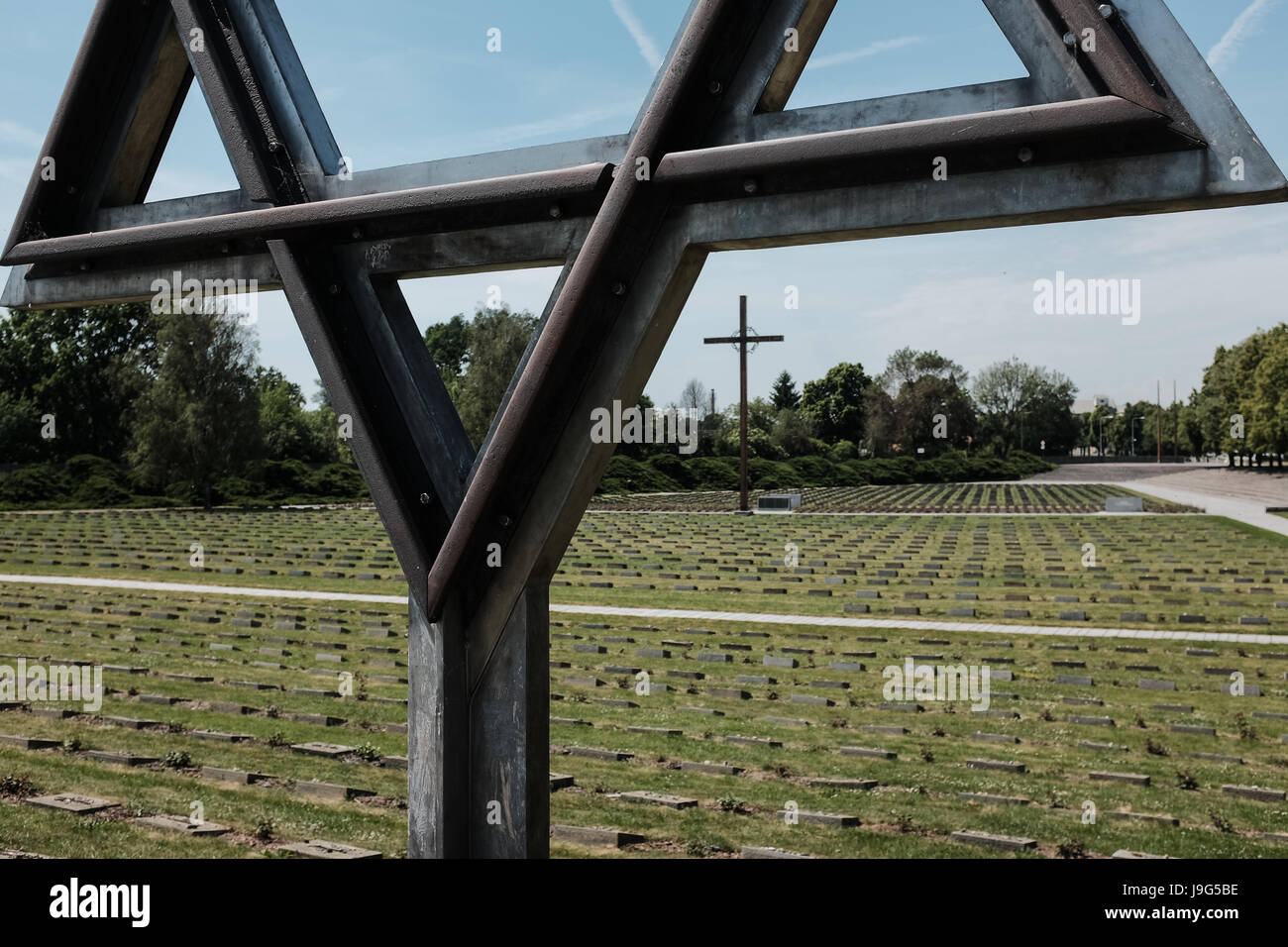 A cross and a Star of David dominate the Terezin Memorial Cemetery ...