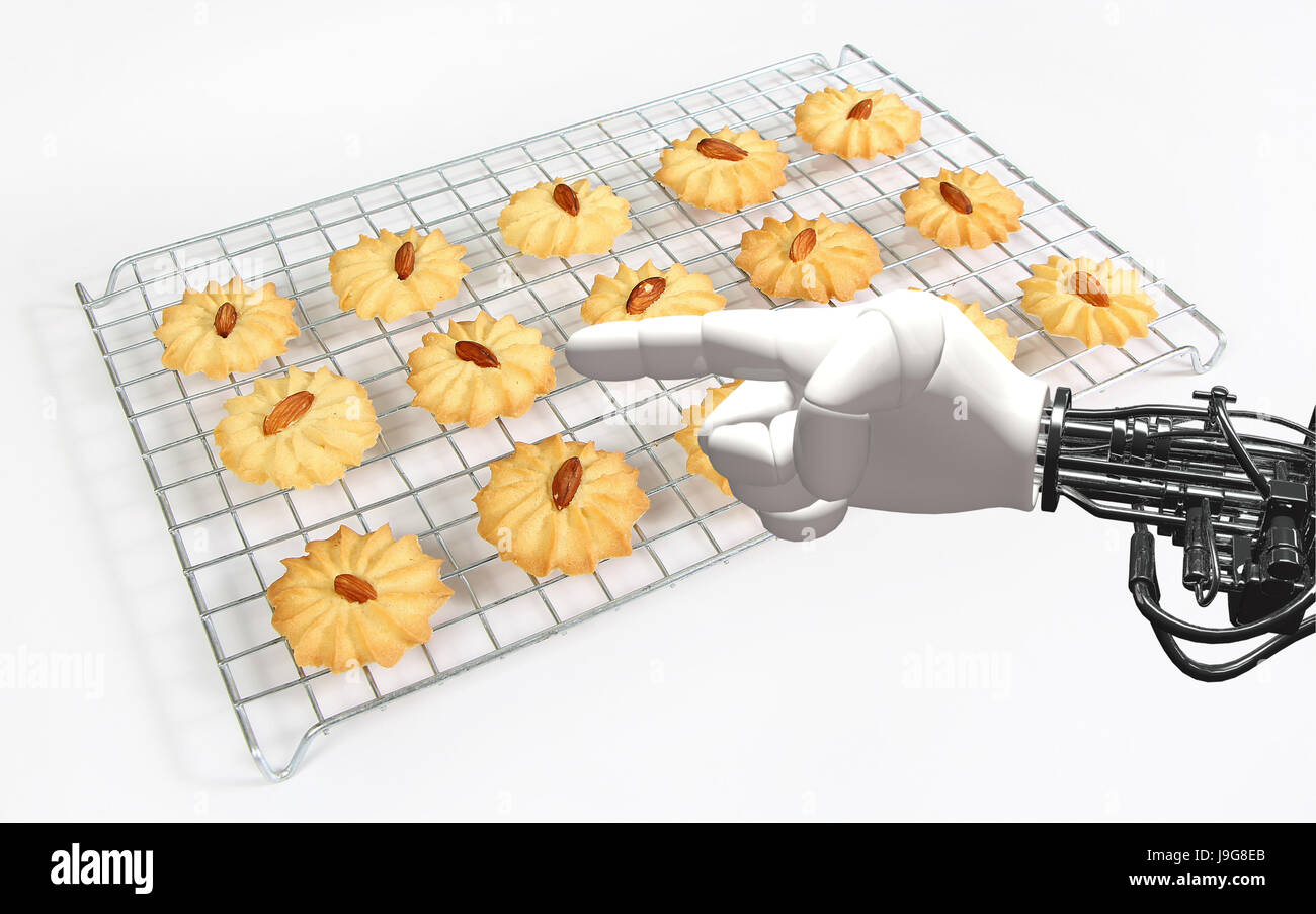 Cookies on a rack with pointing robot arm Stock Photo - Alamy