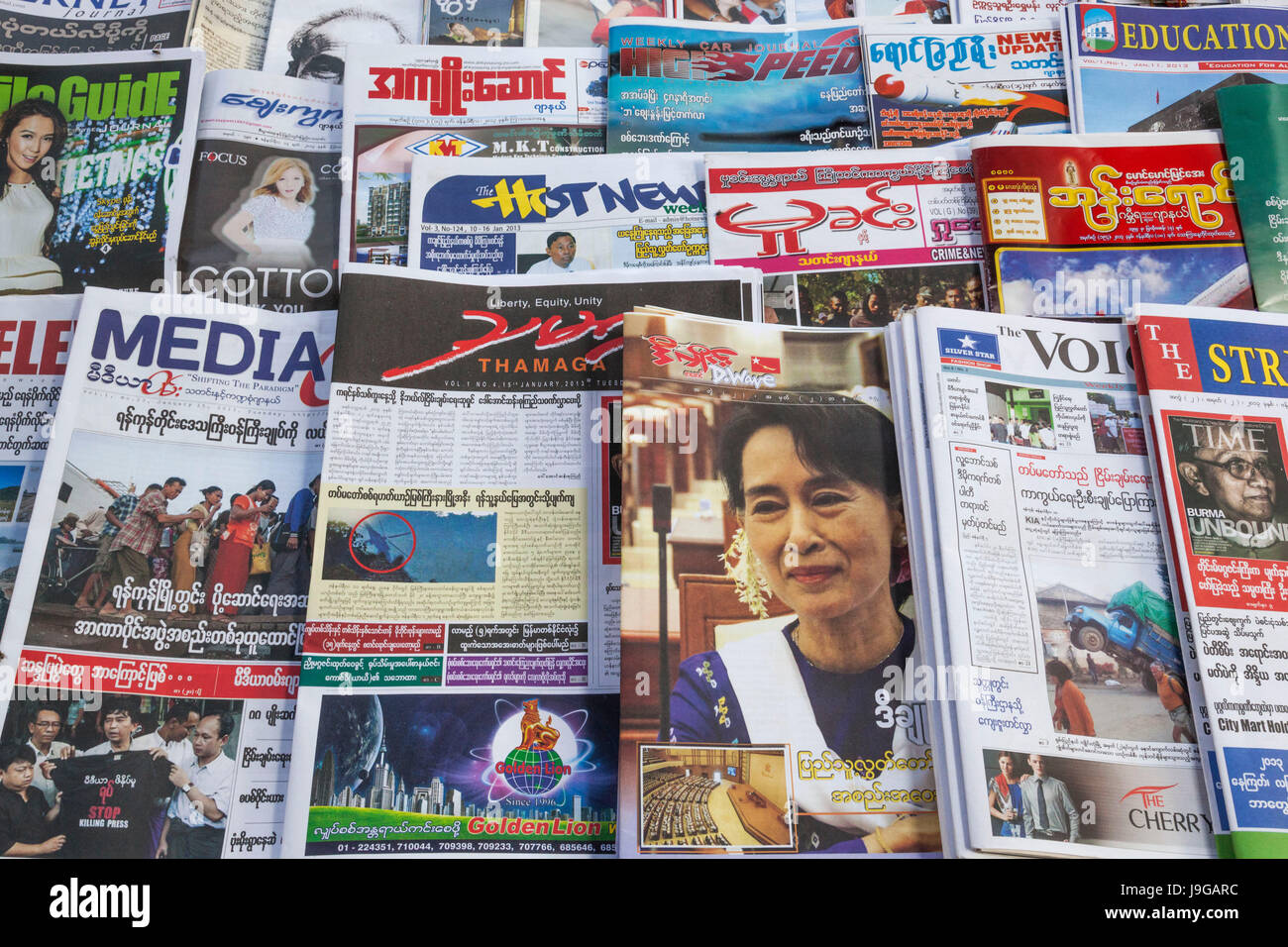 Myanmar, Yangon, Magazine Vendors' Display featuring Aung San Suu Kyi ...