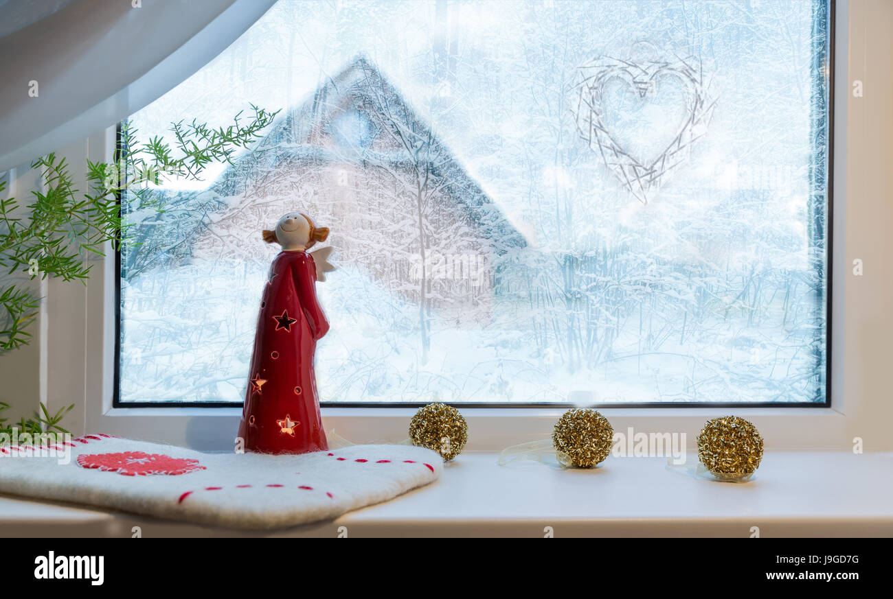 Christmas background, angel on winter window Stock Photo - Alamy