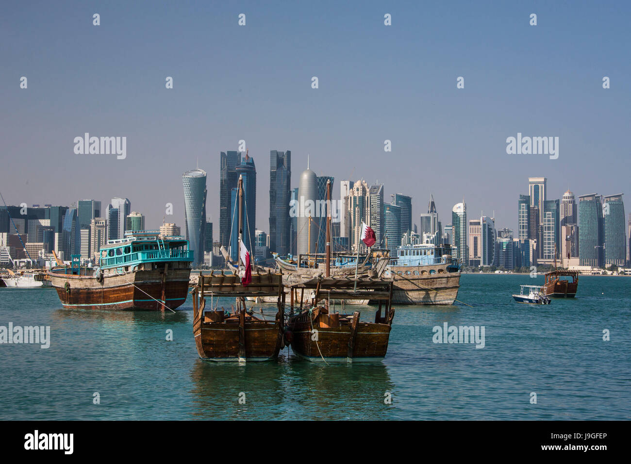 Qatar, Doha City, Traditional boats and West Bay Skyline Stock Photo ...