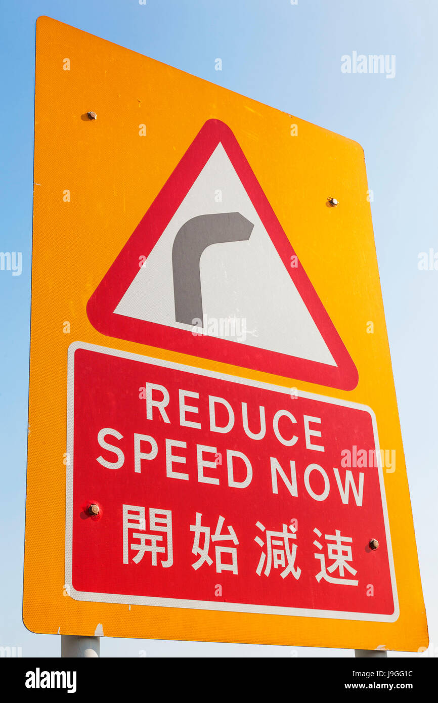 Reduce speed sign hi-res stock photography and images - Alamy