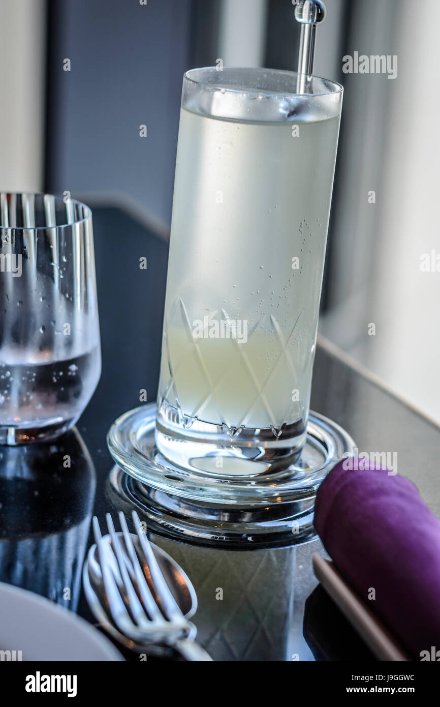 lychee energizer mocktail aperitif cocktail in table setting Stock Photo - Alamy