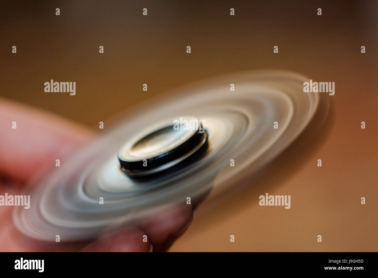 Fidget spinner toy Stock Photo - Alamy