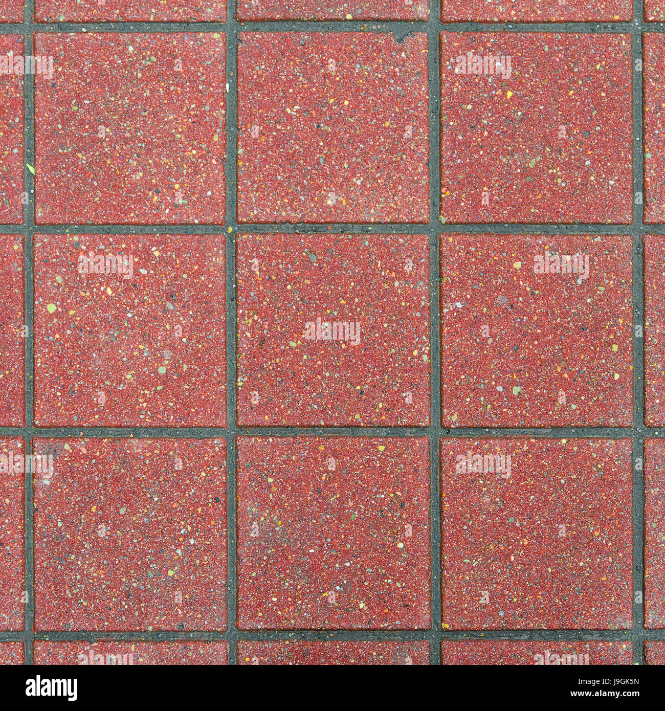 Red brick paving stones on a sidewalk. Abstract background texture ...