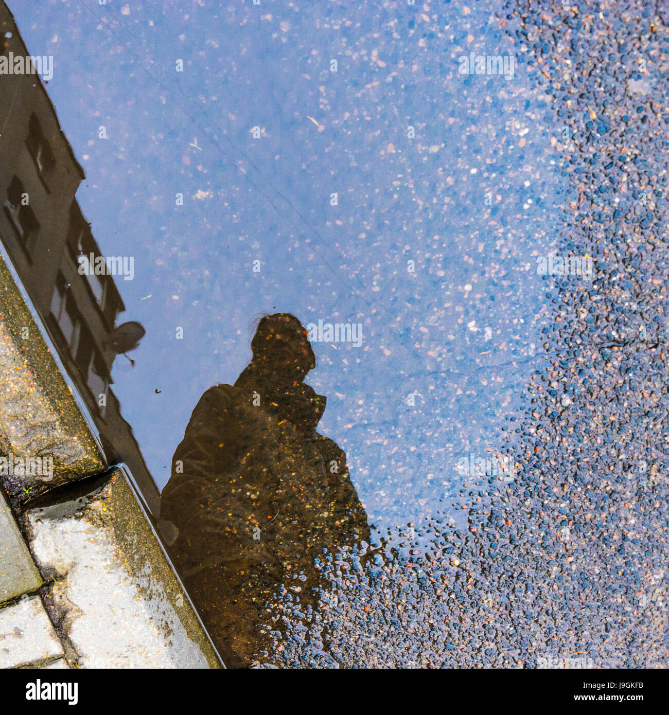 Reflection on puddle in walkway hi-res stock photography and images - Alamy