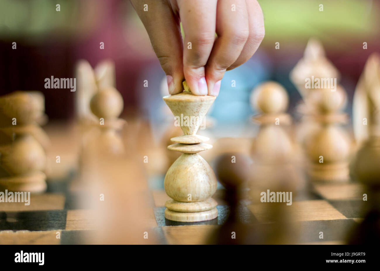 close up child hand touch the king of chess game Stock Photo - Alamy