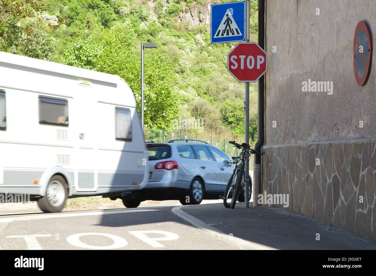 Road signs STOP and pedestrian crossing point on a dangerous street ...