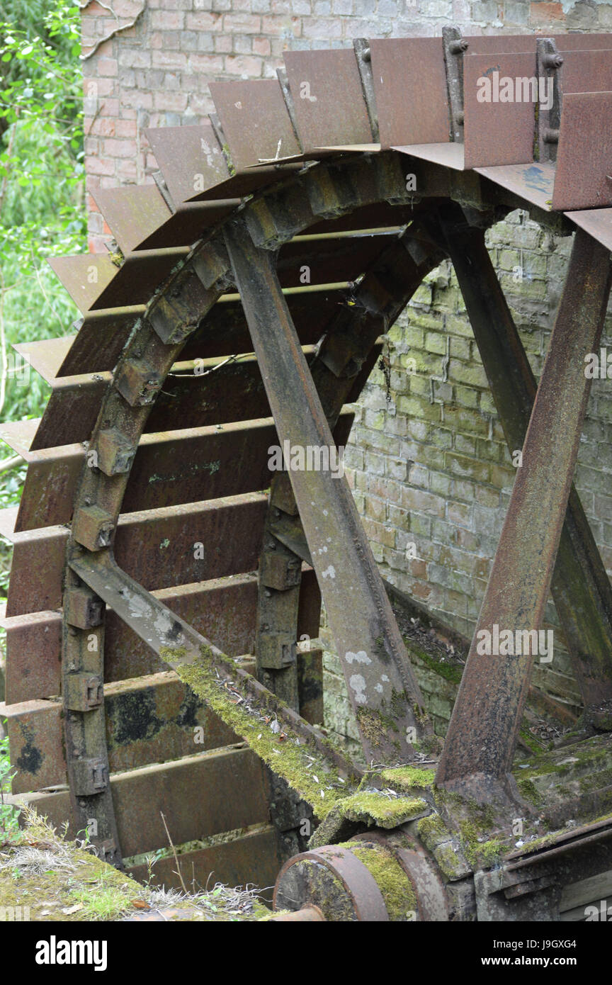 Iron water wheel on mill Stock Photo - Alamy