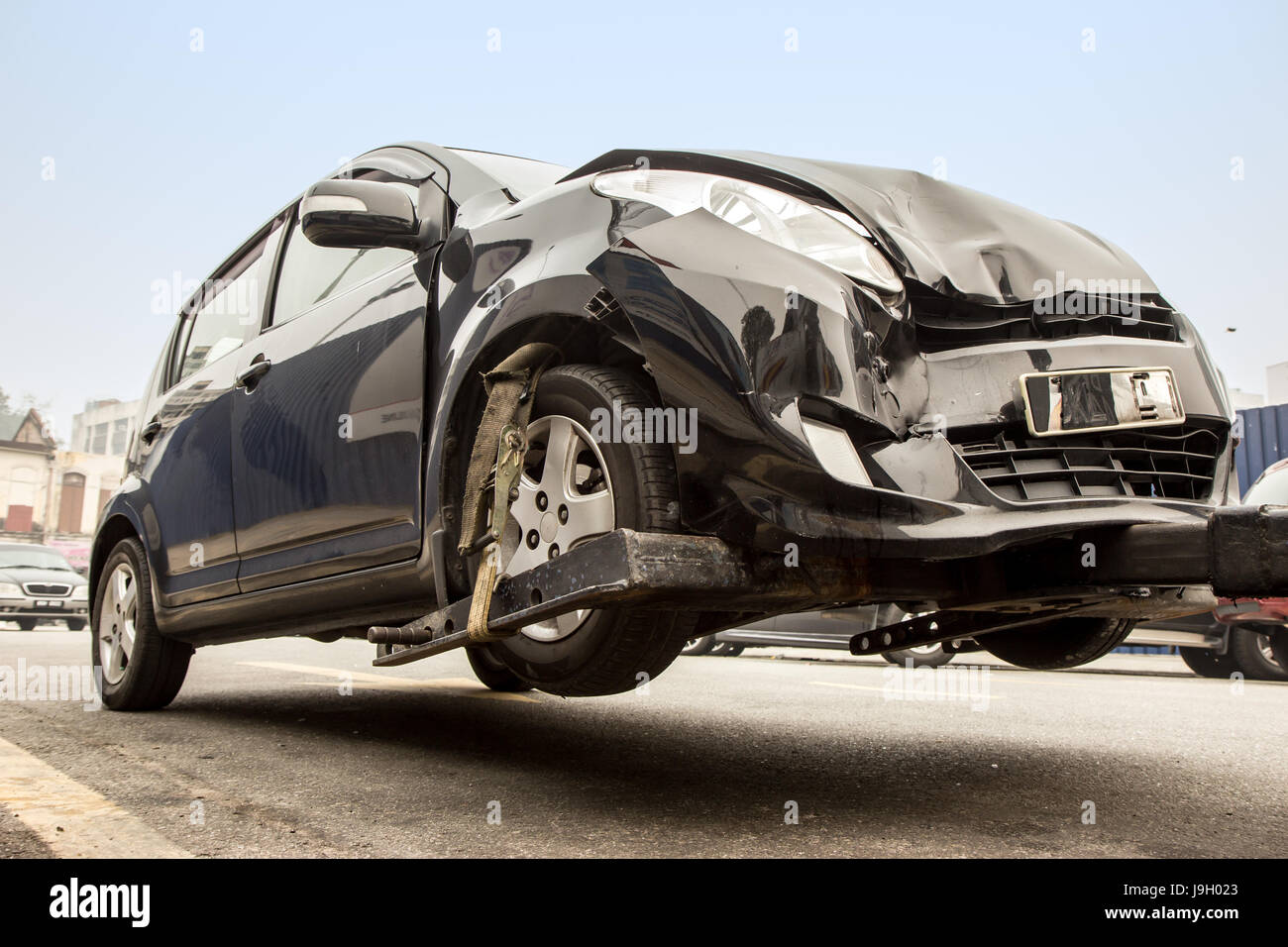 Rescue vehicle service on street to pull crash car. The towing vehicle ...