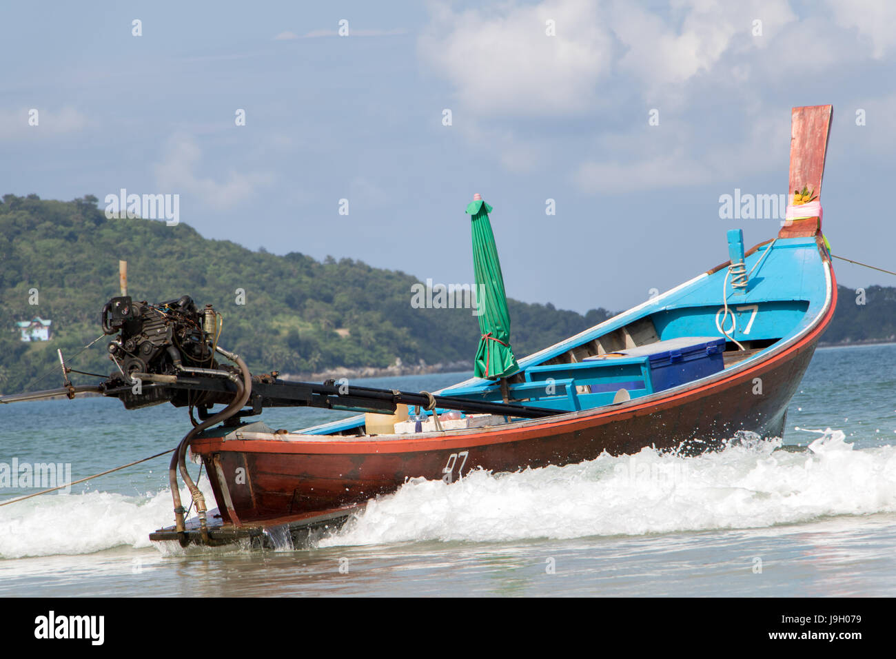 Empty boat in the waves on the sea Stock Photo - Alamy