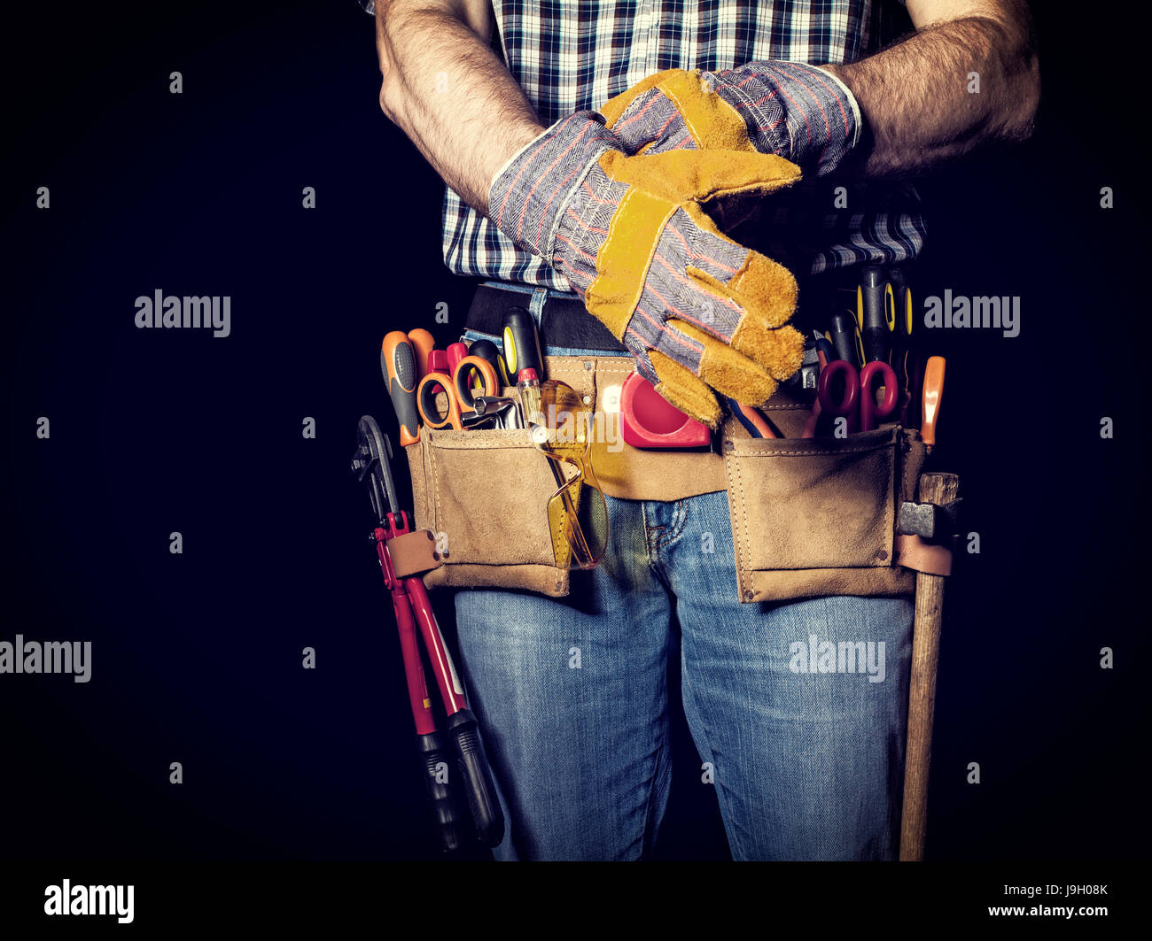 Wearing leather gloves hi-res stock photography and images - Alamy