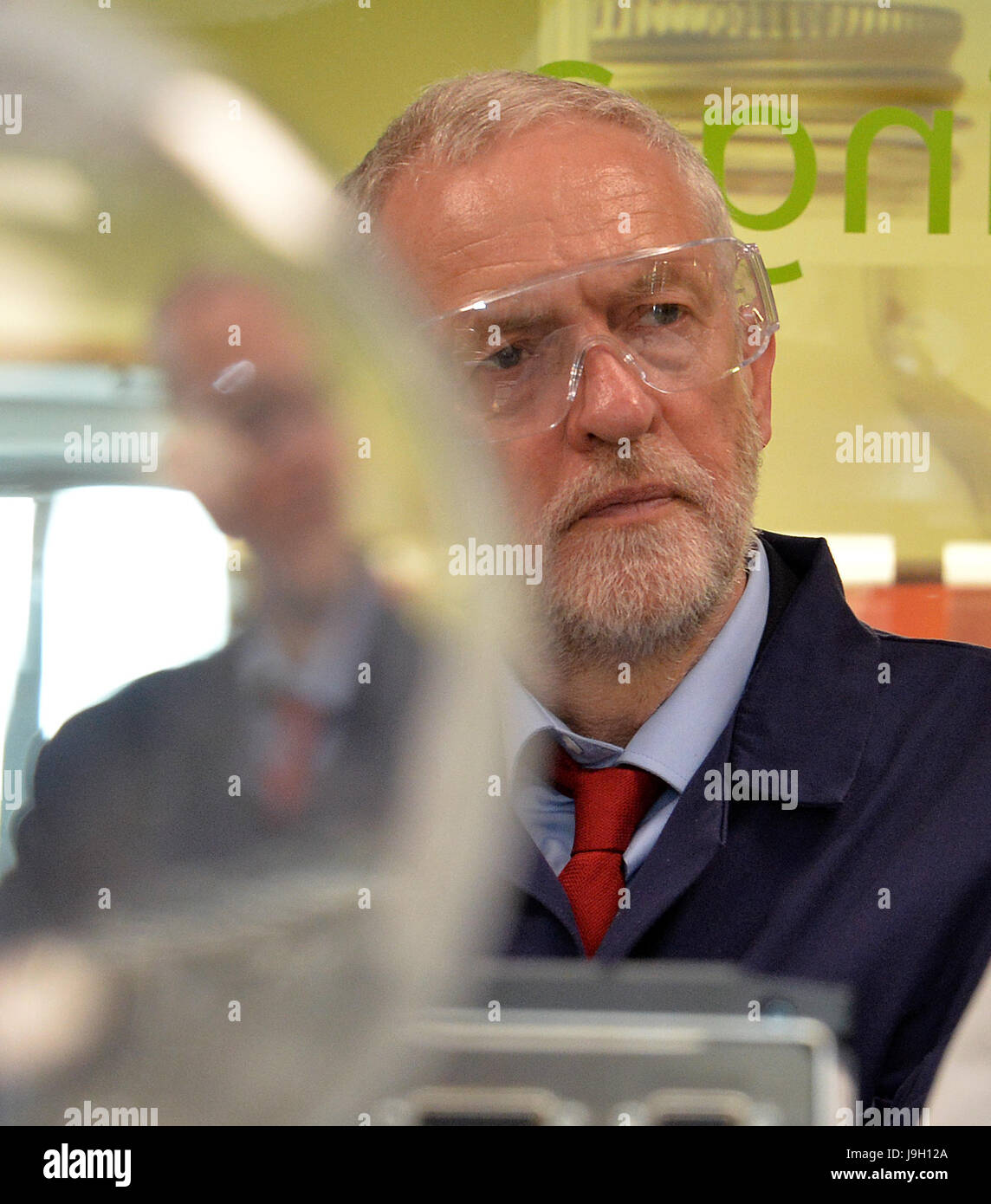 Labour leader Jeremy Corbyn meets laboratory staff during a tour of the ...