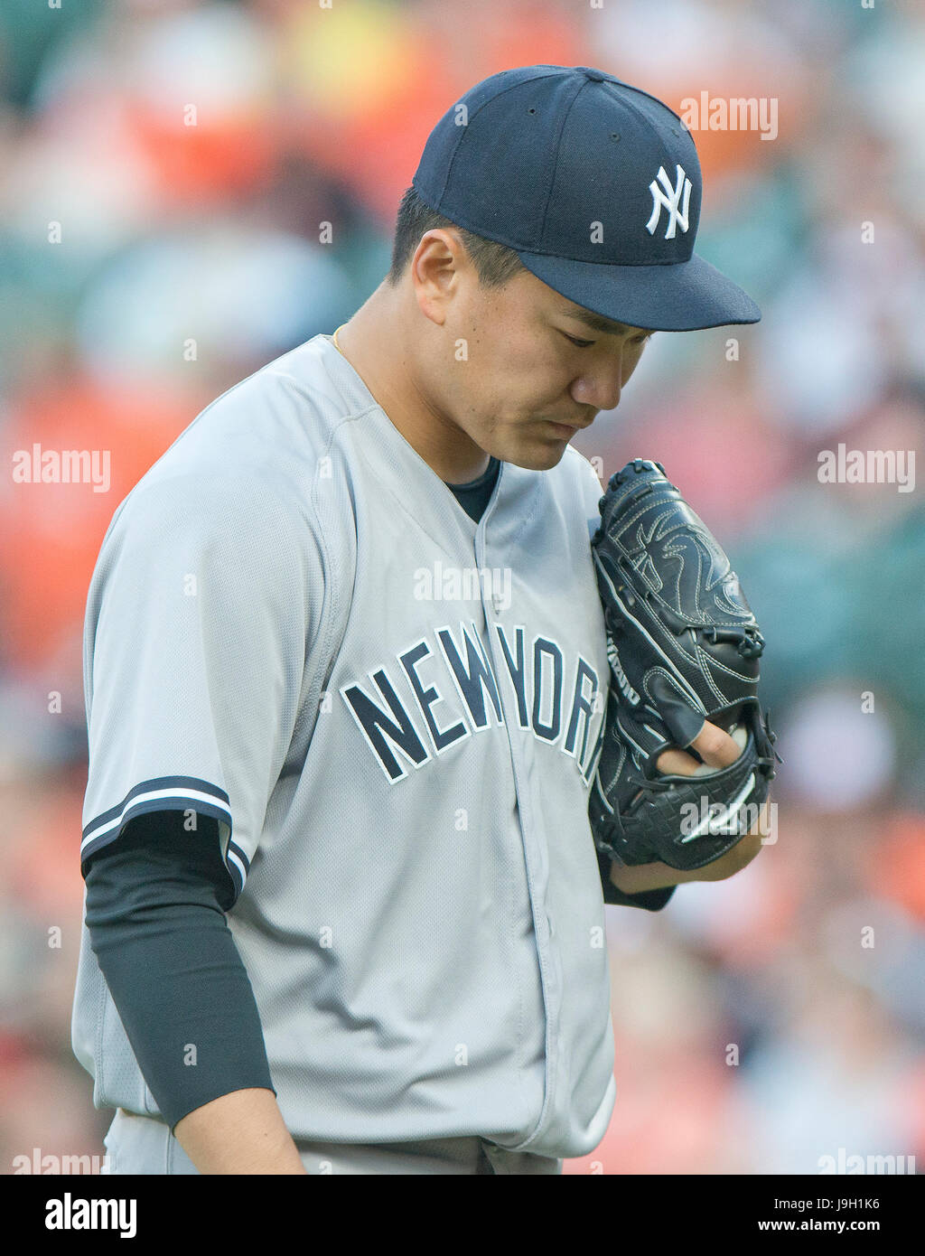 New York Yankees starting pitcher Masahiro Tanaka (19) returns to the ...
