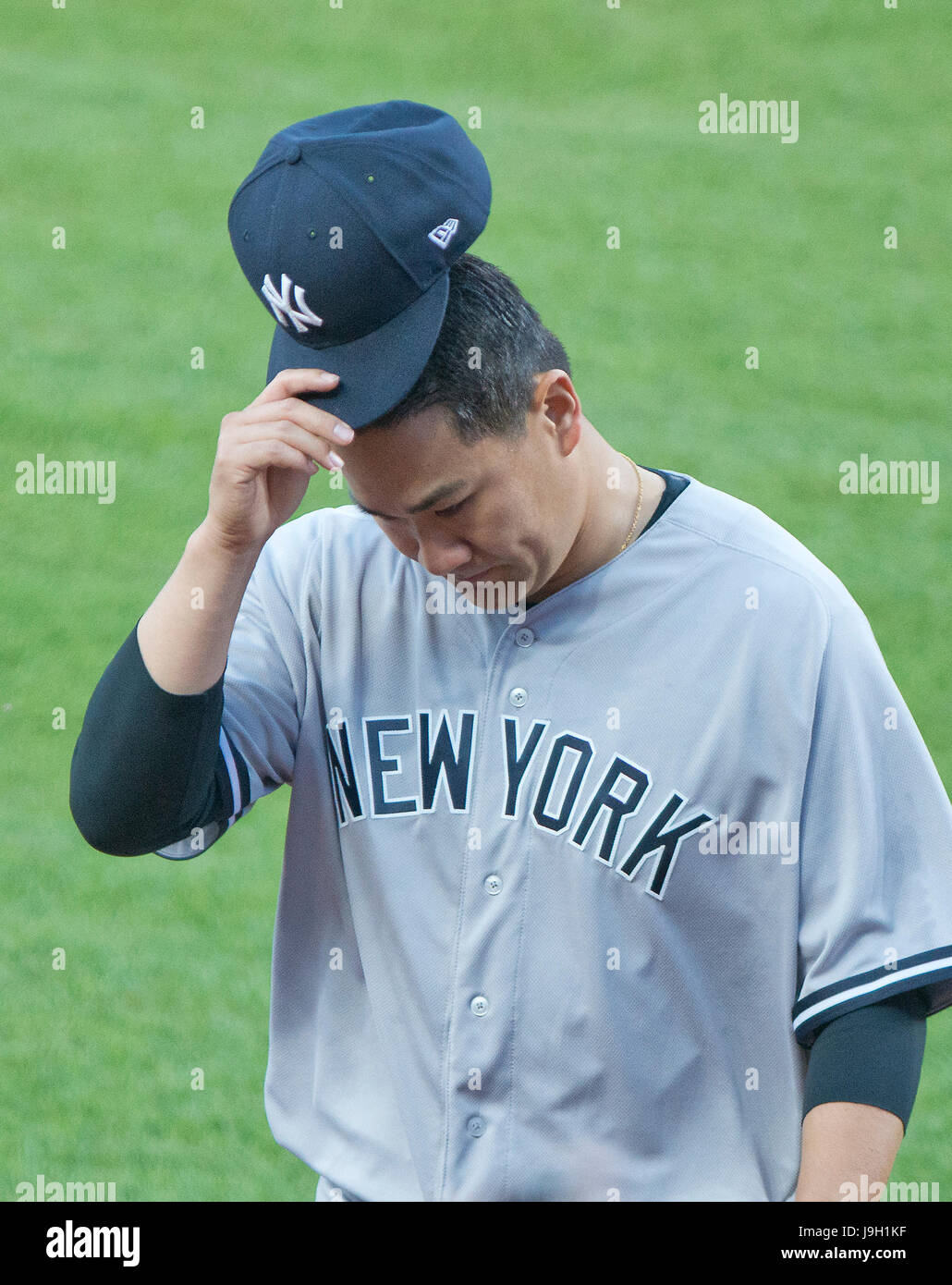 New York Yankees starting pitcher Masahiro Tanaka (19) returns to the ...