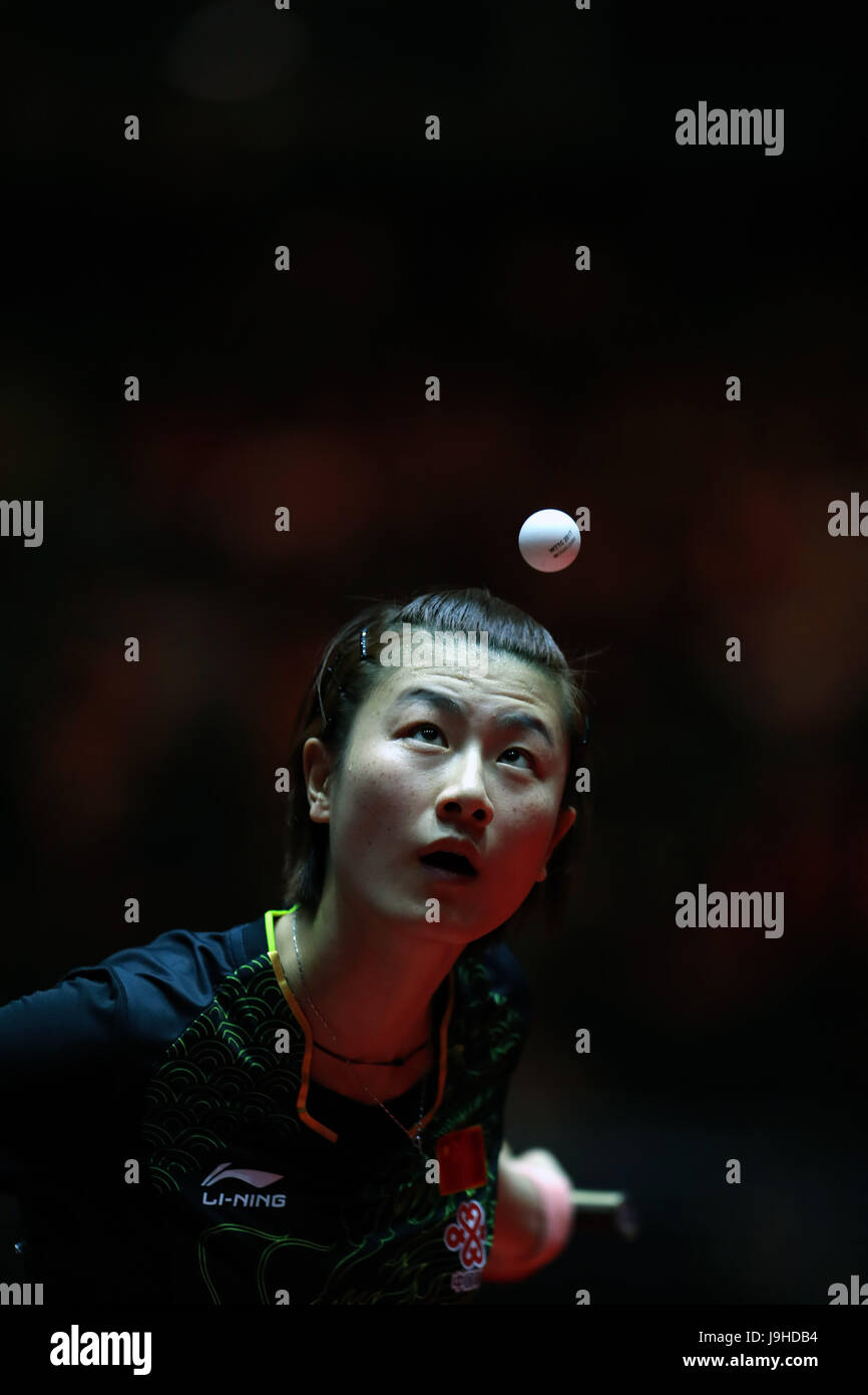 Dusseldorf, Germany. 2nd June, 2017. Ding Ning of China serves the ball ...