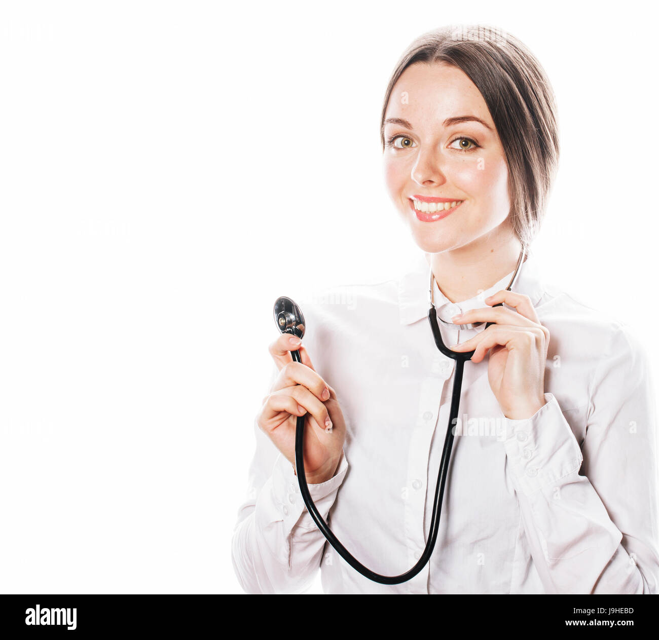 young pretty woman doctor with stethoscope on white background Stock ...
