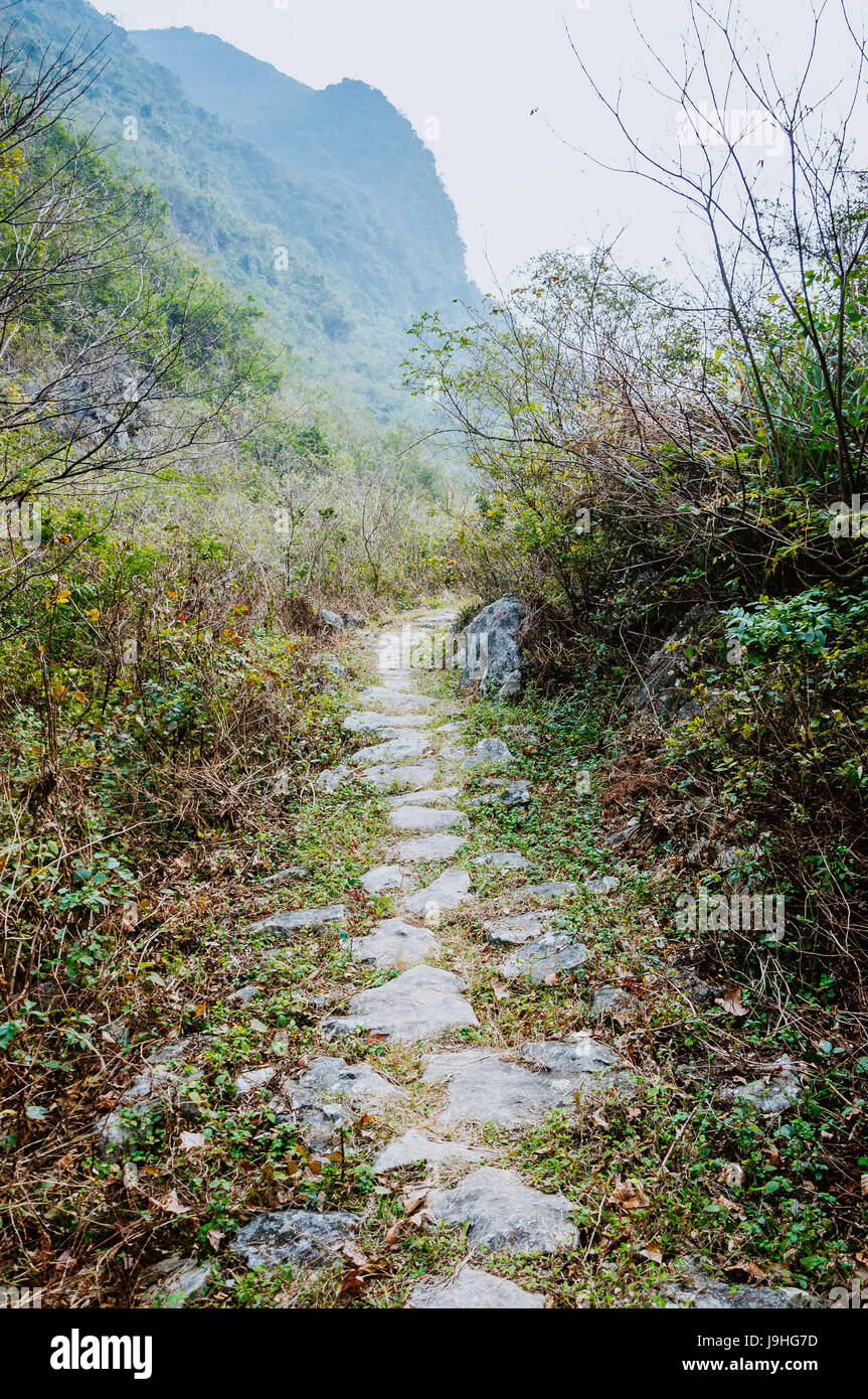 The ancient stone path in the mountain Stock Photo - Alamy