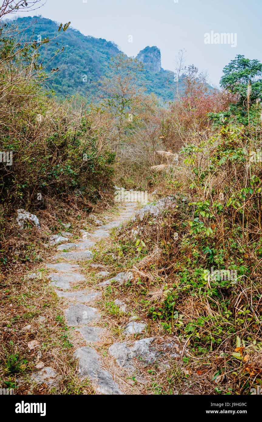 The ancient stone path in the mountain Stock Photo - Alamy