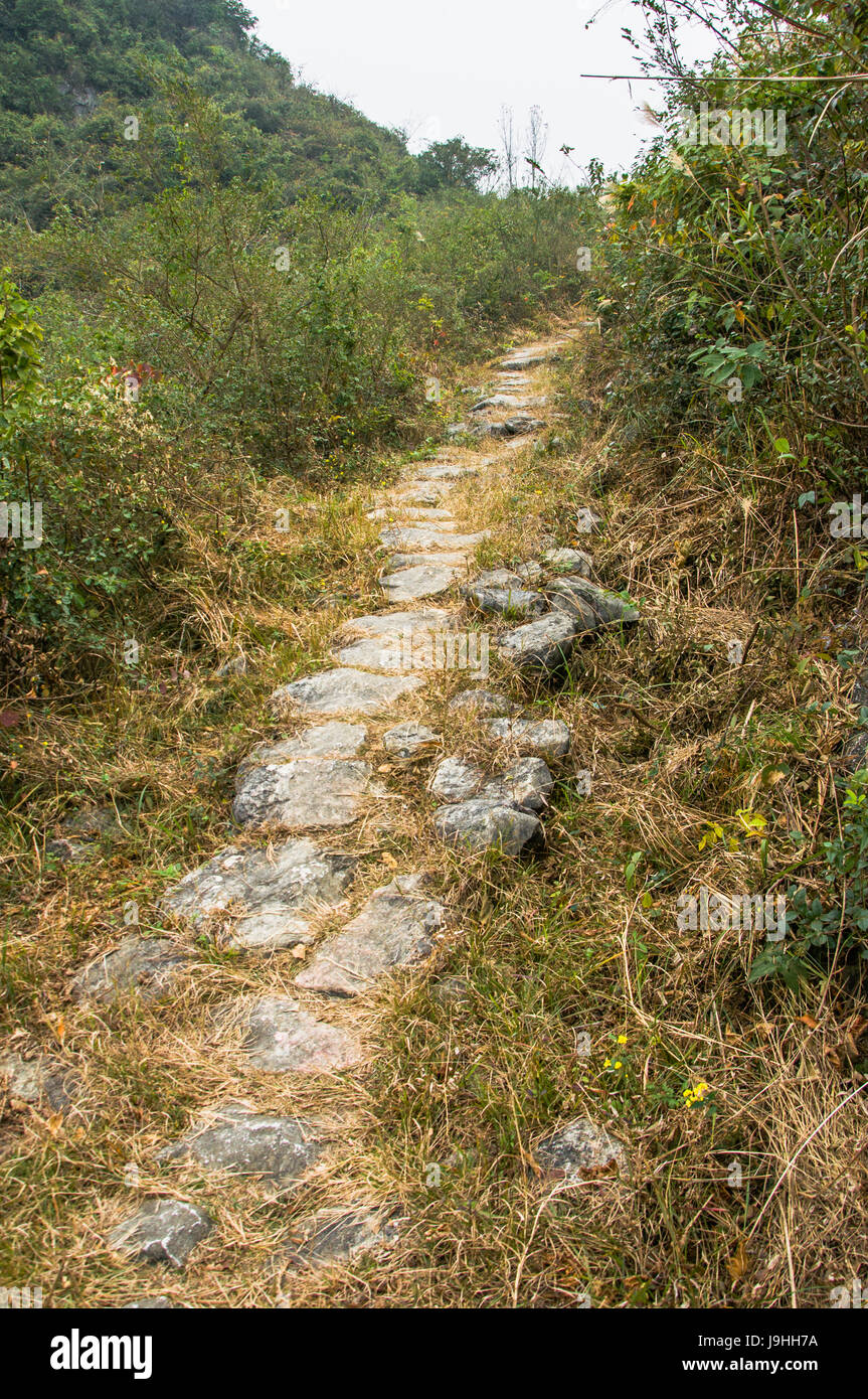 The ancient stone path in the mountain Stock Photo - Alamy