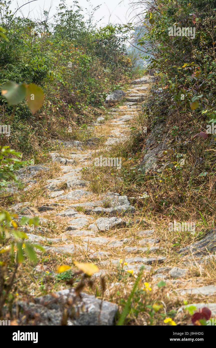 The ancient stone path in the mountain Stock Photo - Alamy