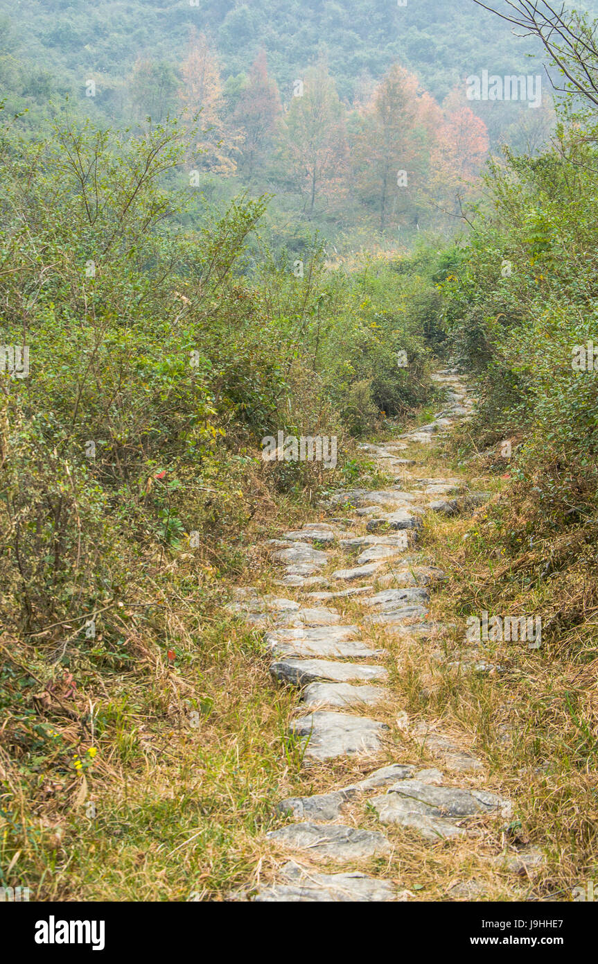 The ancient stone path in the mountain Stock Photo - Alamy