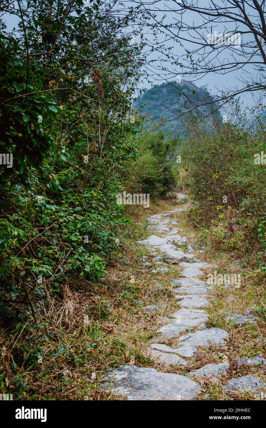 The ancient stone path in the mountain Stock Photo - Alamy