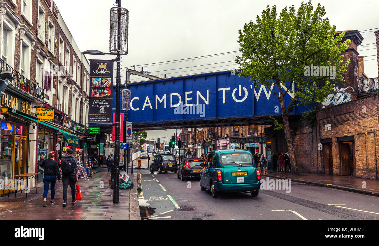 Double decker bus running under Camden Town railway bridge, Chalk Farm ...