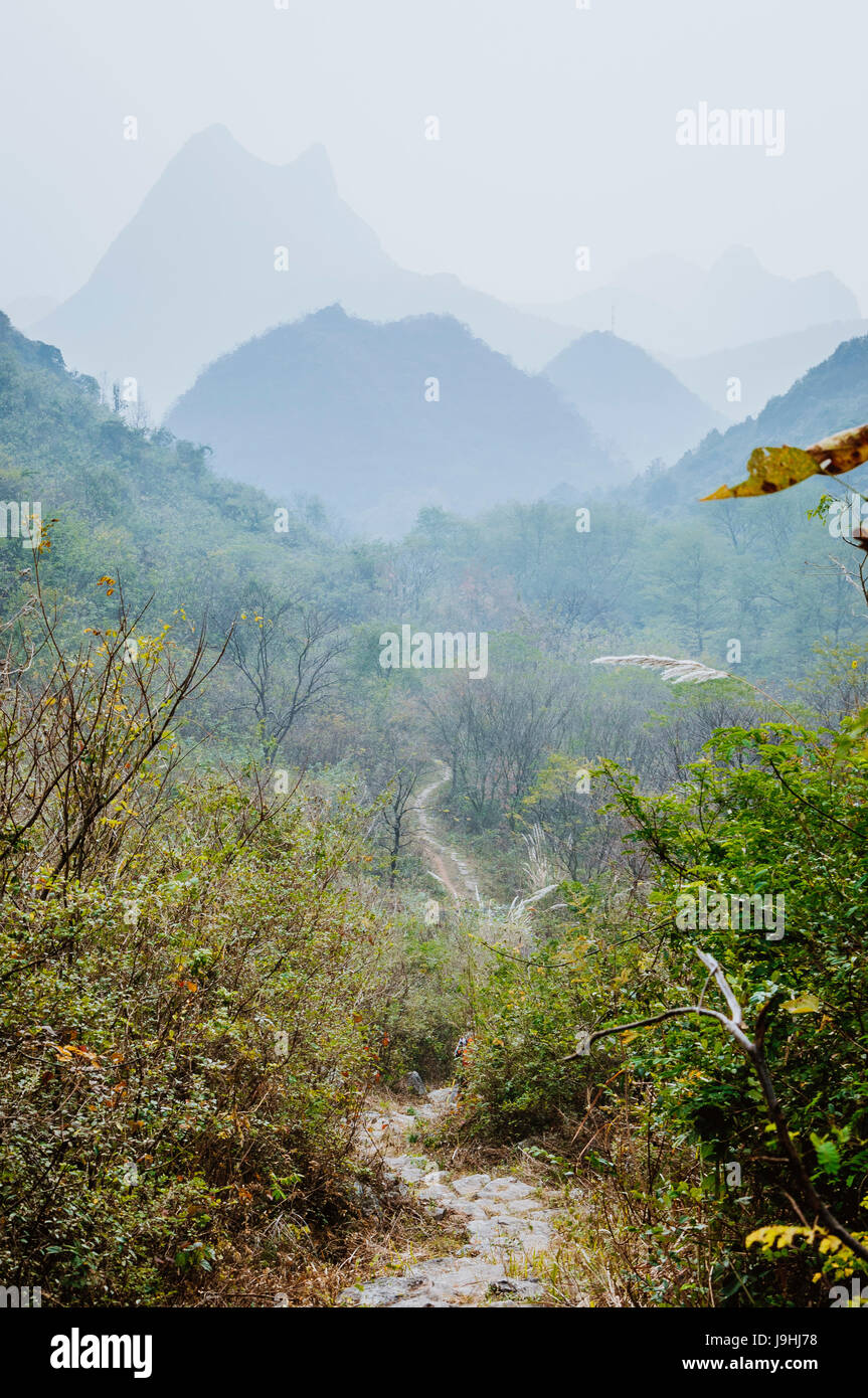 The ancient stone path in the mountain Stock Photo - Alamy