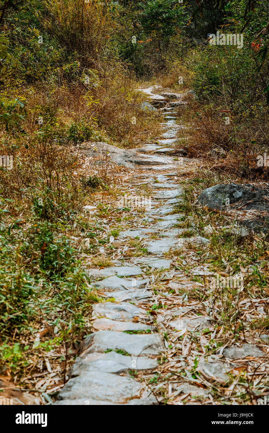 The ancient stone path in the mountain Stock Photo - Alamy