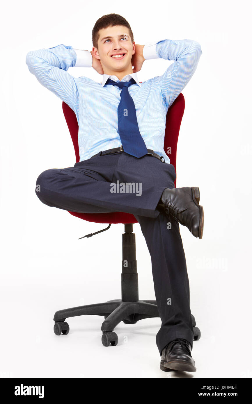 Seated young man resting arm hi-res stock photography and images - Alamy