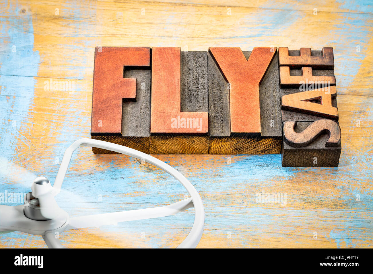 Fly safe - drone operation reminder - word abstract in letterpress wood ...