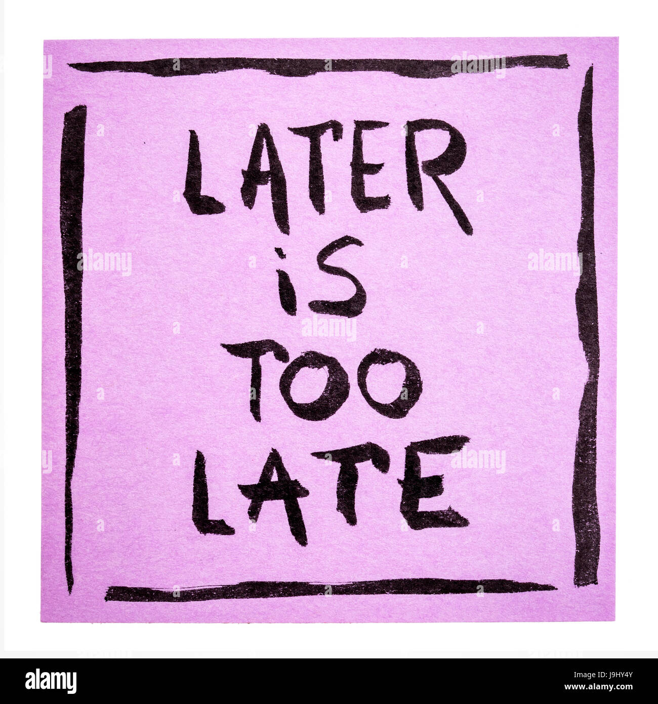 Later is too late - motivational handwriting on an isolated sticky note ...