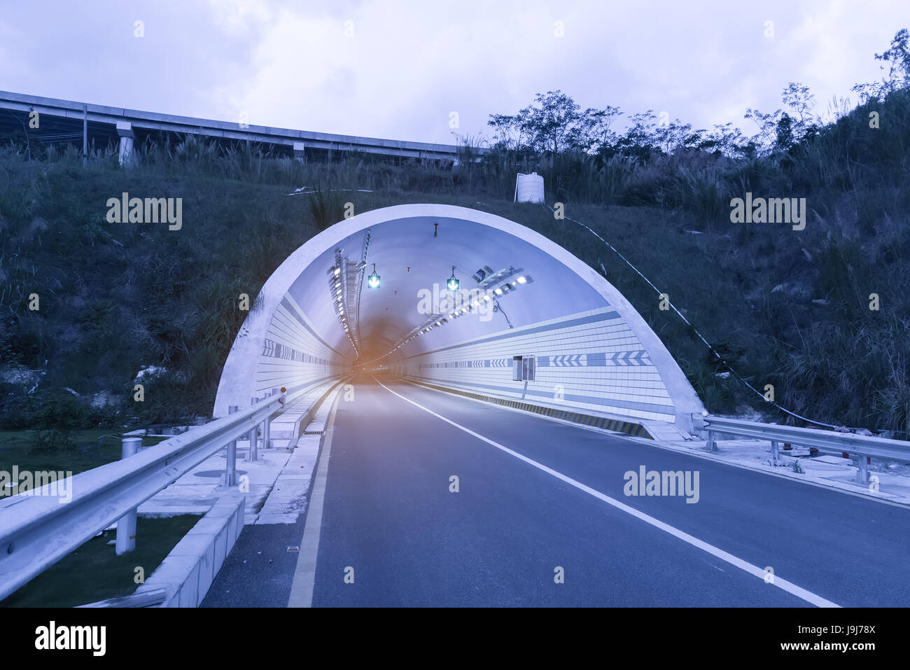highway entrance to the tunnel Stock Photo - Alamy