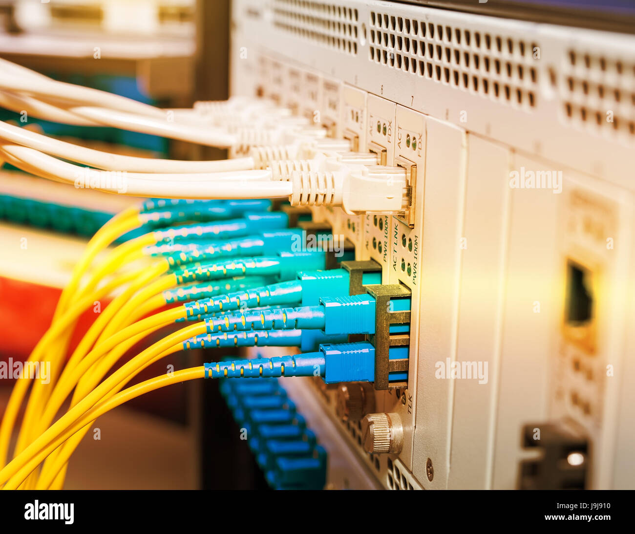 Fiber Optic cables connected to optic ports and UTP, Network cables ...
