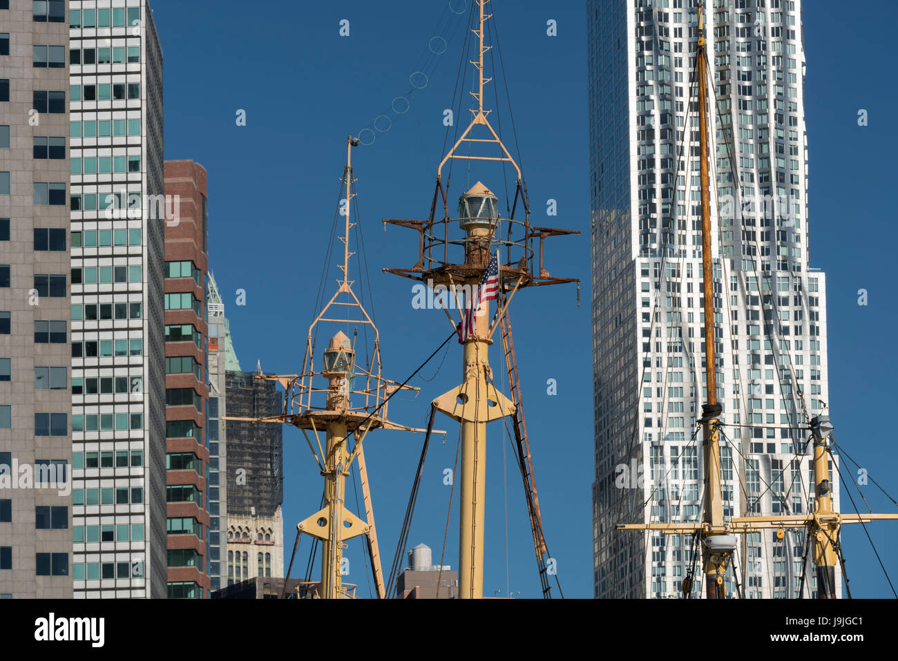 8 Spruce Street skyscraper, ship mast of the South Street Seaport ...